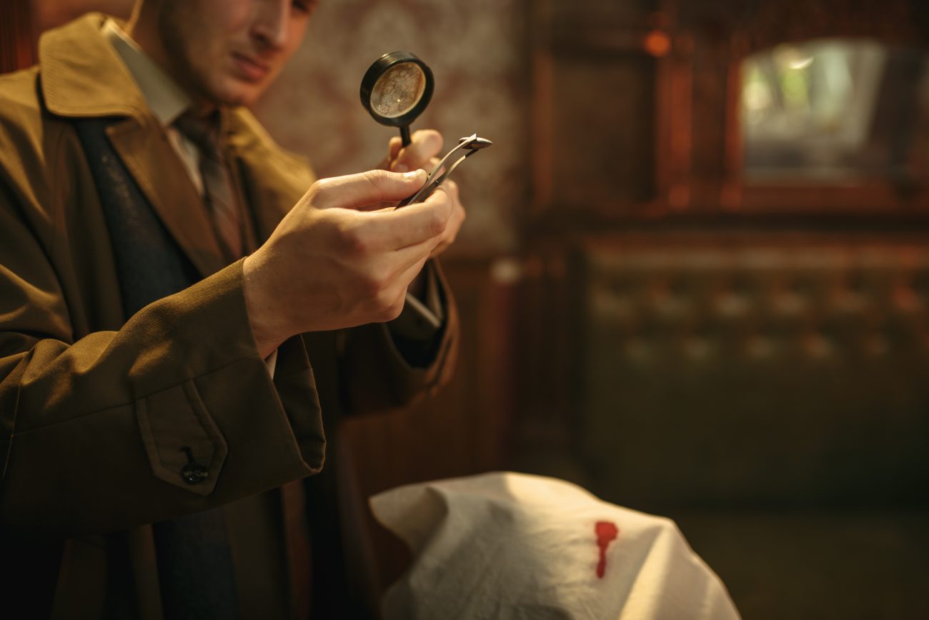 detective-looks-evidence-through-magnifying-glass-V6L6ZG7 | Nature of ...